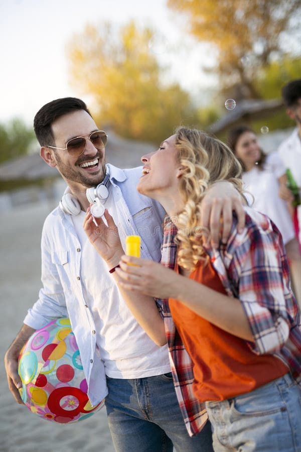 Group of Young Cheerful Friends Playing with Ball Stock Image - Image ...
