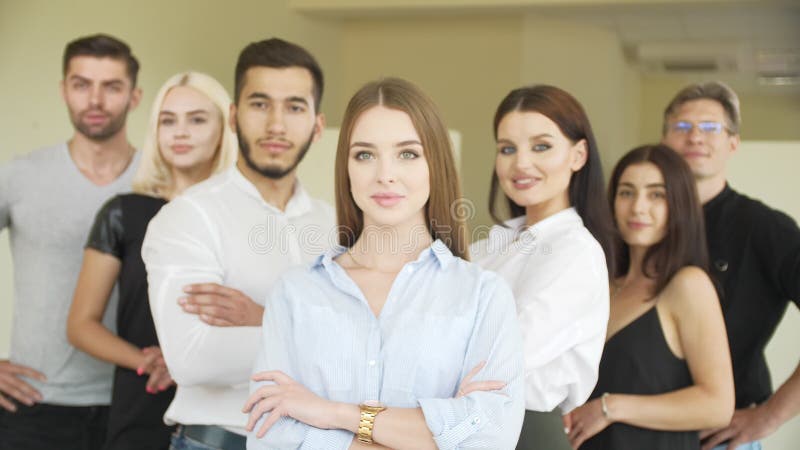 A Group of Young Cheerful People are Looking Forward and Up they are ...