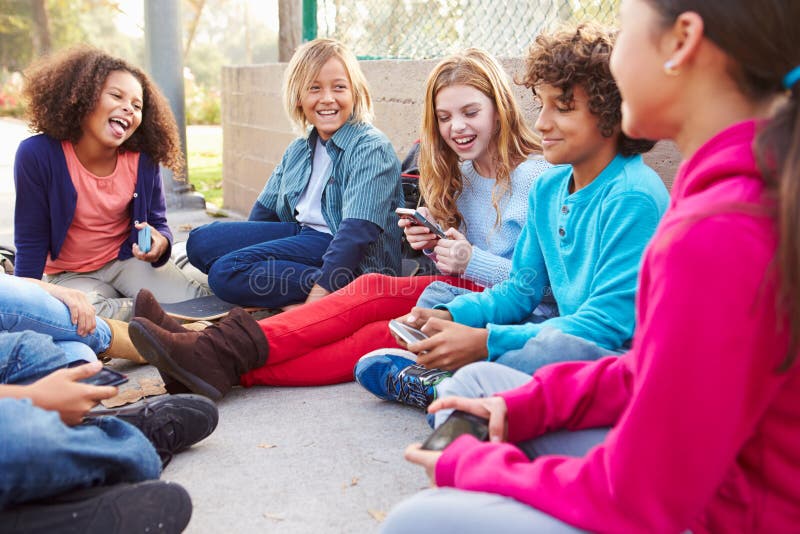 Group of Young Children Hanging Out in Playground Stock Photo - Image ...