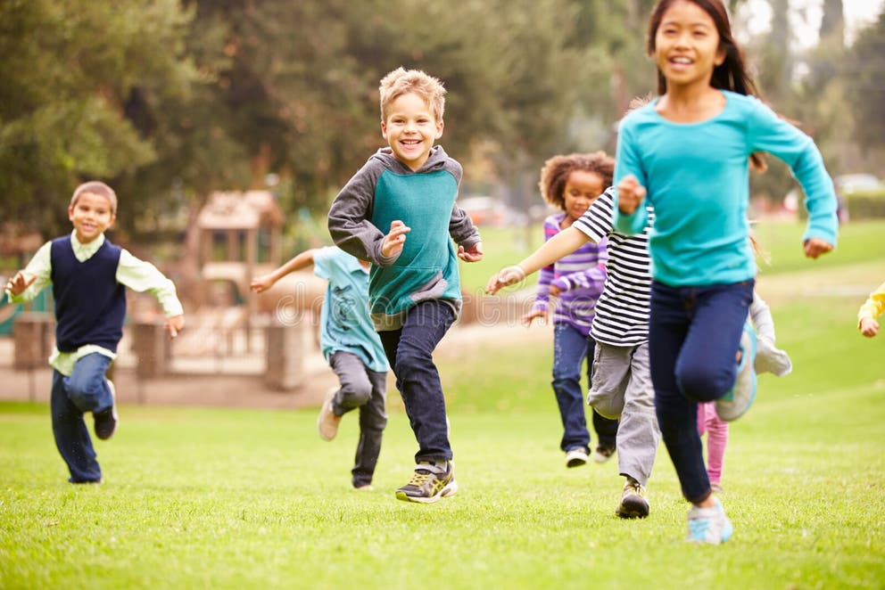 Group of Young Children Running Towards Camera in Park Stock Image ...