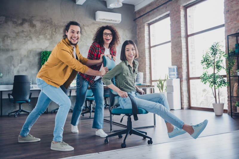 Group of Young Colleagues Enjoying Teamwork in a Fun and Lively Office ...