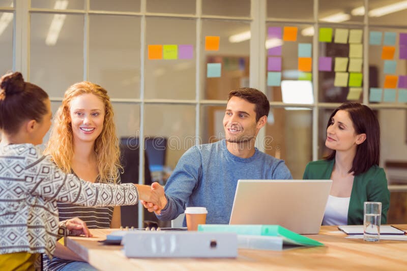 Group of Young Colleagues Using Laptop Stock Photo - Image of cool ...