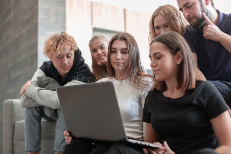 Group of Young Colleagues Using Laptop at Office Stock Image - Image of ...