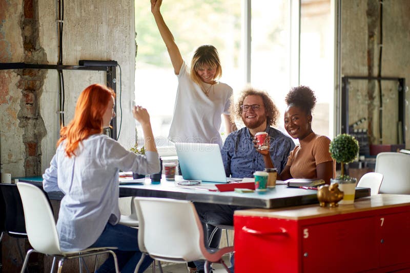 Group of Young Colleagues are Working in a Pleasant Atmosphere in the ...