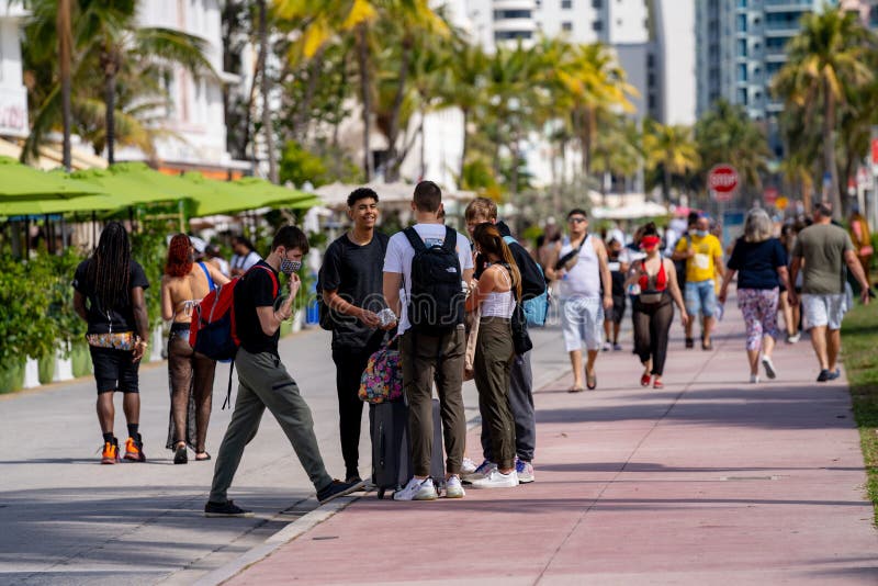 Group of Young College Aged People Gathering in Miami Beach Spring ...