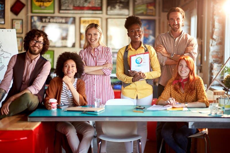Group of Young Creative Employees are Posing for a Photo while Working ...