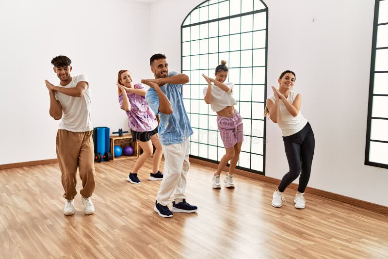 Group of Young Dancer Smiling Happy Dancing Choreography at Dance ...