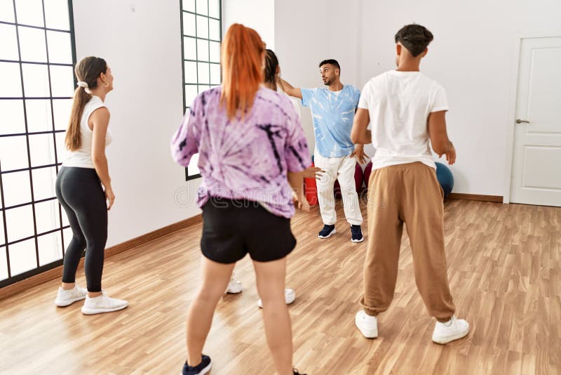 Group of Young Dancer Smiling Happy Dancing Choreography at Dance ...