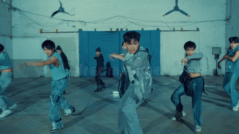 Group of Young Dancers in Urban Setting Performing a Routine with ...