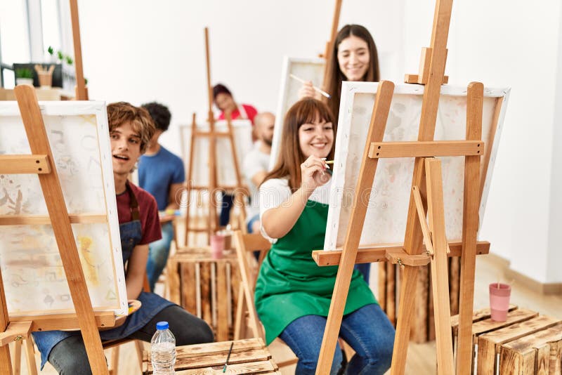 Group of Young Draw Students Smiling Happy Drawing at Art Studio Stock ...