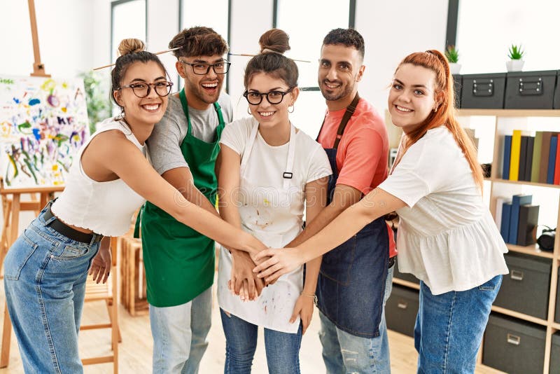 Group of Young Draw Students Smiling Happy Standing with Hands Together ...