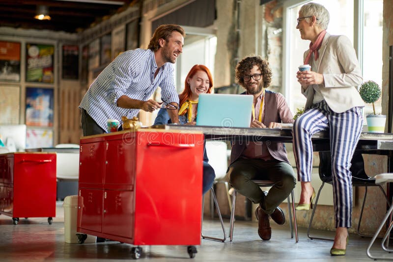 Group of Young Employees Consulting Stock Photo - Image of indoors ...