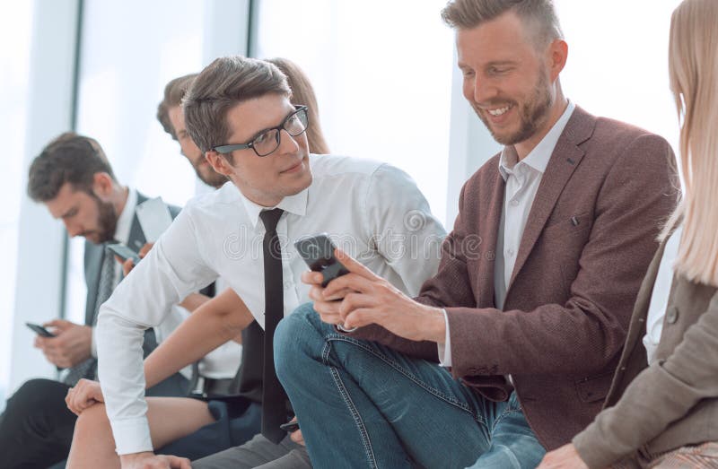 Group of Young Employees Discussing Online News. Stock Image - Image of ...