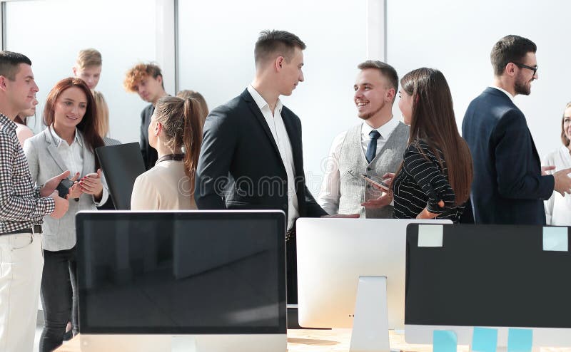 Group of Young Employees Discussing Work Issues Stock Image - Image of ...