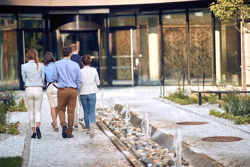 Group of Young Employees Entering the Business Building Stock Image ...
