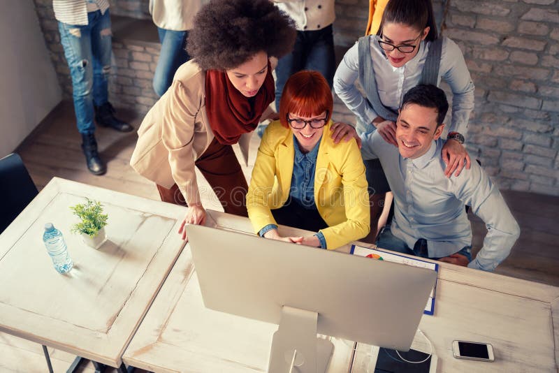 Group of Employees Looking on Computers Screen Stock Photo - Image of ...