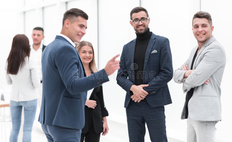 Group of Young Employees Standing in the Office. Stock Photo - Image of ...