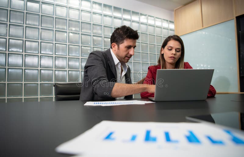 A Group of Young Entrepreneurs. is Exchanging Ideas with New Work Stock ...