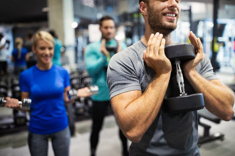 Group of Young Friends People Doing Exercises in Gym Stock Image ...