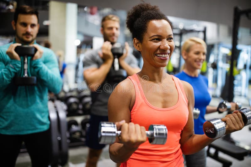 Group of Young Friends People Doing Exercises in Gym Stock Image ...