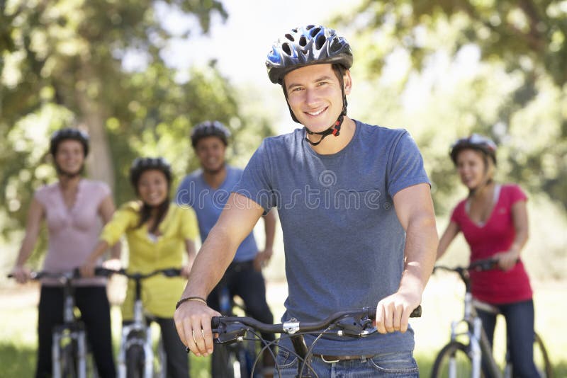 Group of Young Friends on Cycle Ride in Countryside Stock Image - Image ...