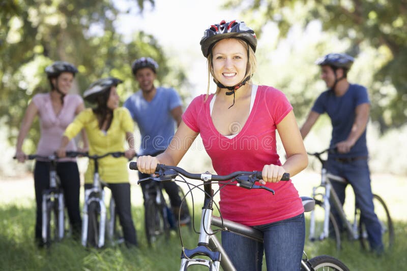 Group of Young Friends on Cycle Ride in Countryside Stock Image - Image ...