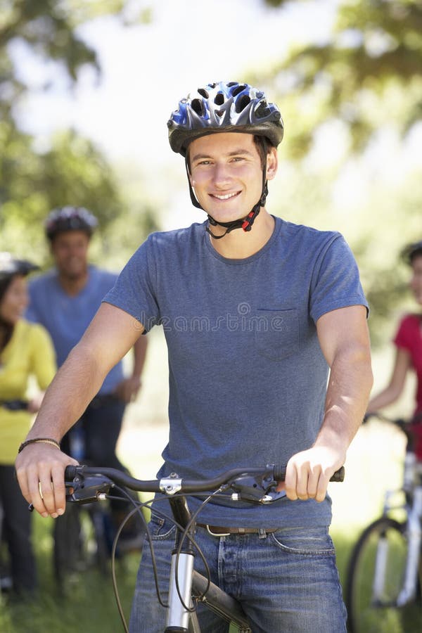 Group of Young Friends on Cycle Ride in Countryside Stock Image - Image ...