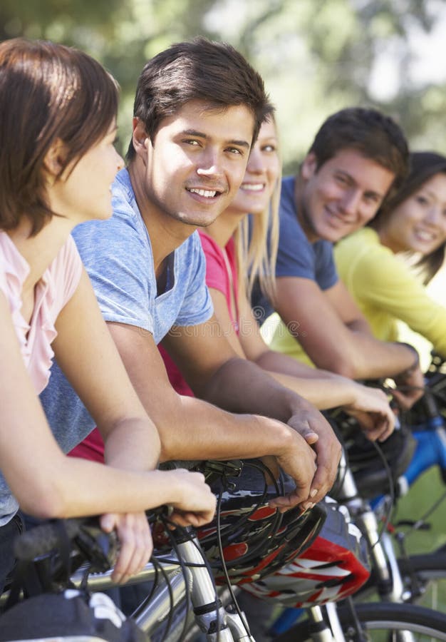 Group of Young Friends on Cycle Ride in Countryside Stock Photo - Image ...