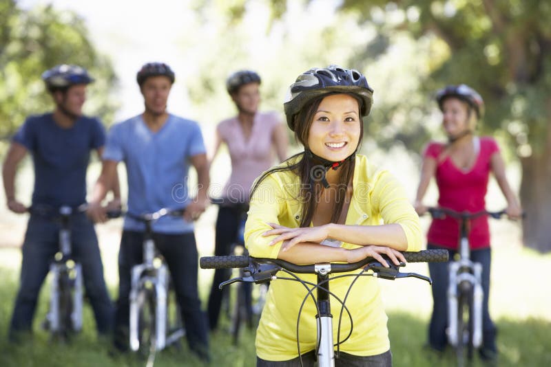 Group of Young Friends on Cycle Ride in Countryside Stock Photo - Image ...