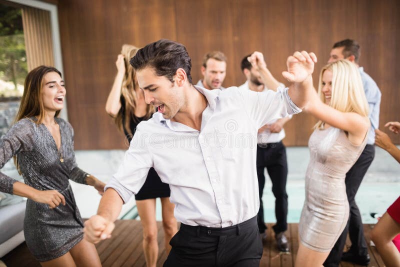 Group of Young Friends Dancing Stock Photo - Image of excitement ...