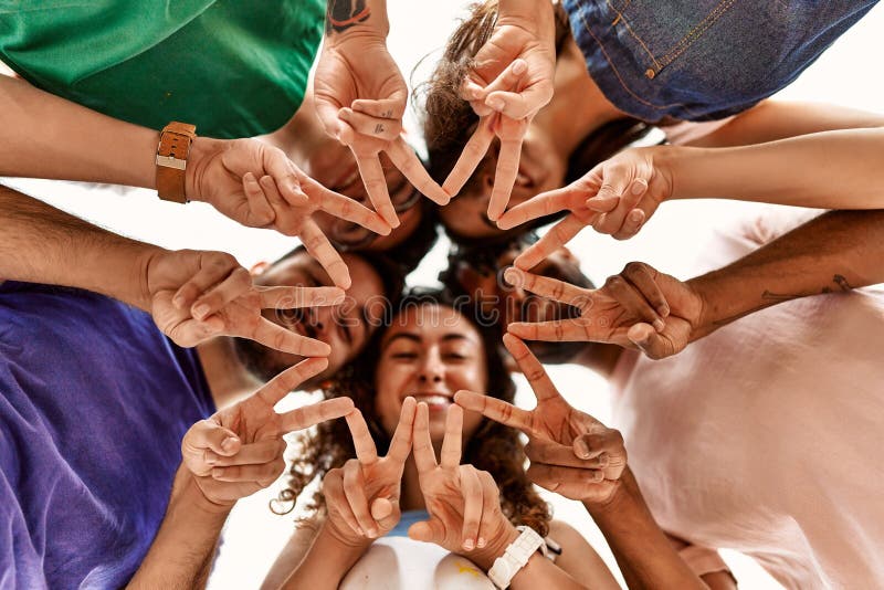 Group of Young Friends Doing Victory Sign with Fingers and Hands ...