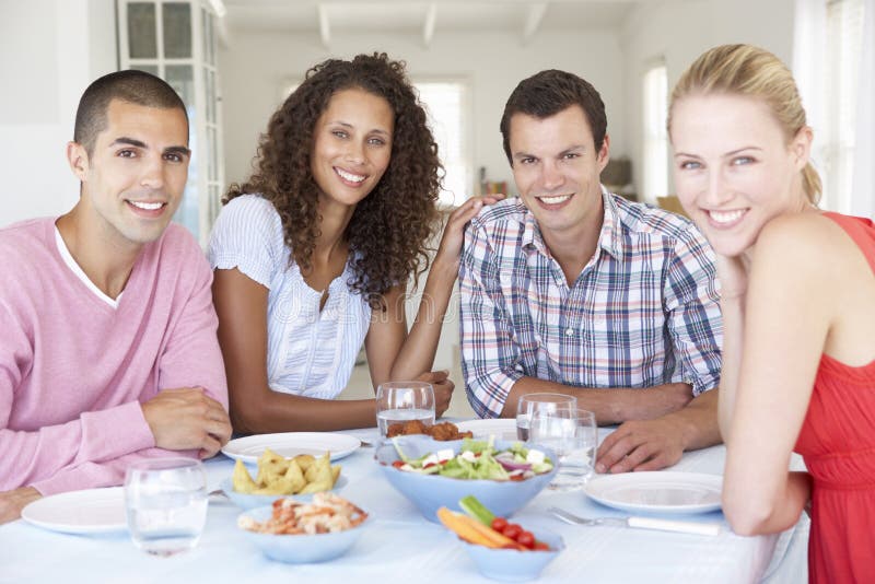 Group of Young Friends Eating Meal at Home Stock Image - Image of salad ...