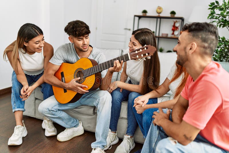 Group of Young Friends Having Party Playing Guitar at Home Stock Image ...