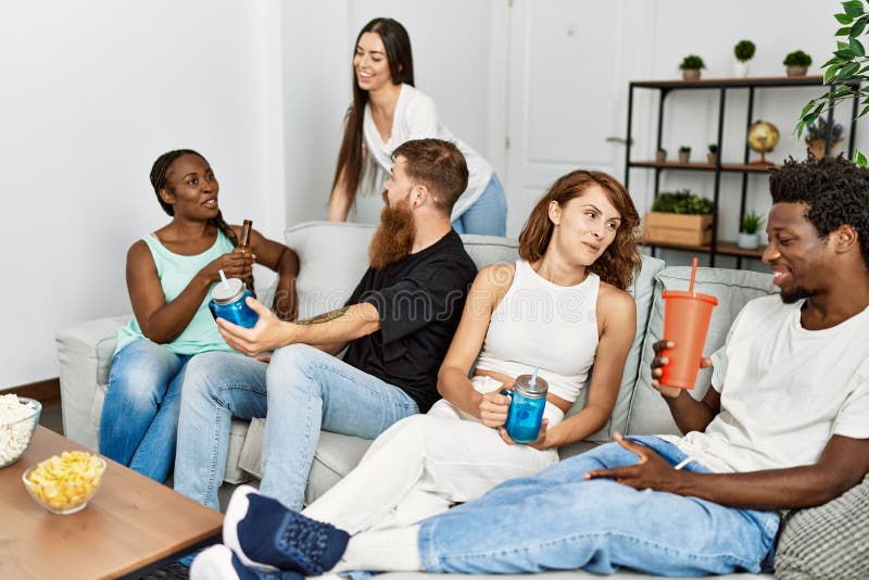 Group of Young Friends Having Party Sitting on the Sofa at Home Stock ...