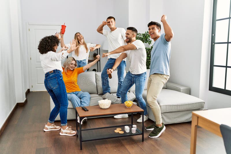 Group of Young Friends Having Party Smiling Happy and Dancing at Home ...