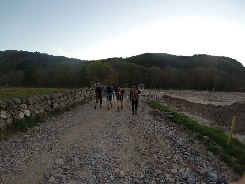 Group of Young Friends Hiking on the Stone Paths in the Mountains Stock ...