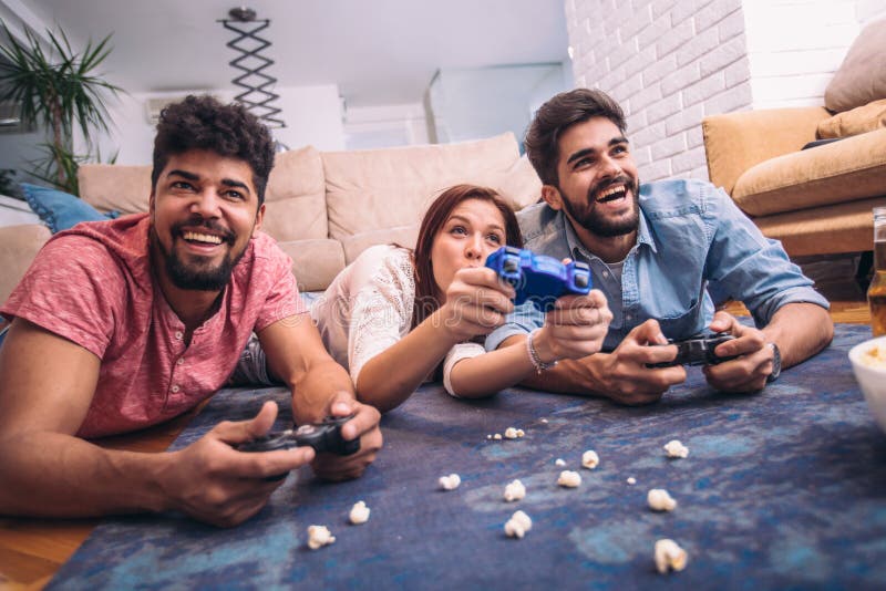 Group of Young Friends Play Video Games Together Stock Photo - Image of ...