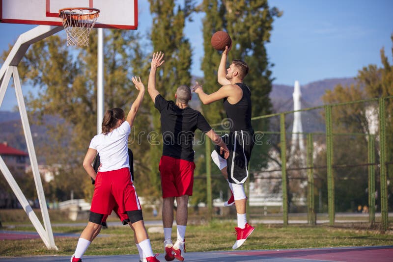 Group of Young Friends Playing Basketball Match Stock Photo - Image of ...