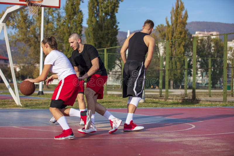 Group of Young Friends Playing Basketball Match Stock Image - Image of ...