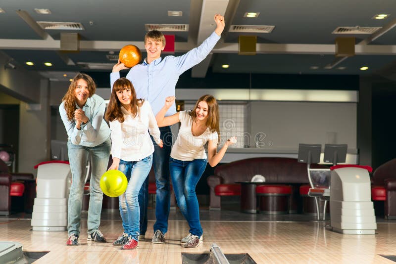 Group of Young Friends Playing Bowling Stock Photo - Image of accuracy ...