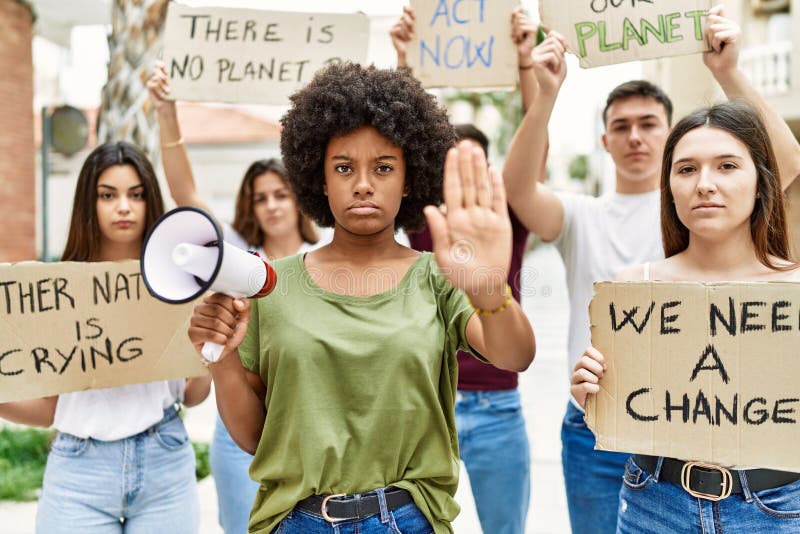Group of Young Friends Protesting and Giving Slogans at the Street with ...