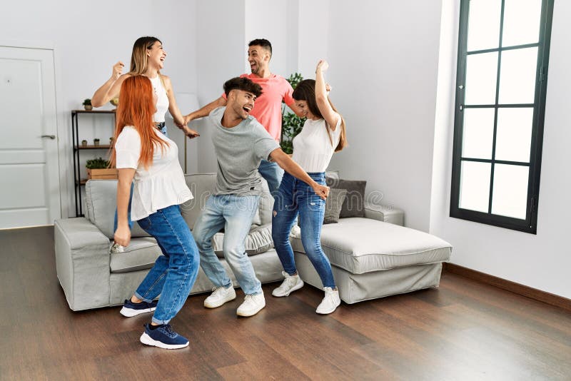 Group of Young Friends Smiling Happy and Dancing at Home Stock Image ...