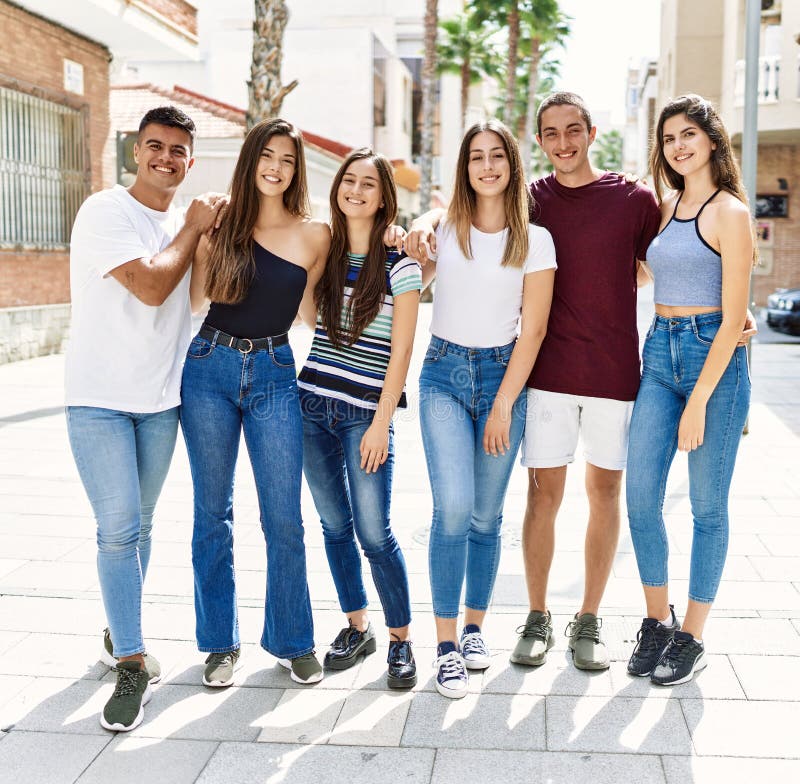 Group of Young Friends Smiling Happy and Hugging Standing at the City ...