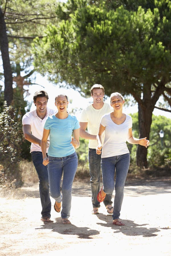 Group of Young Friends on Walk in Countryside Stock Image - Image of ...