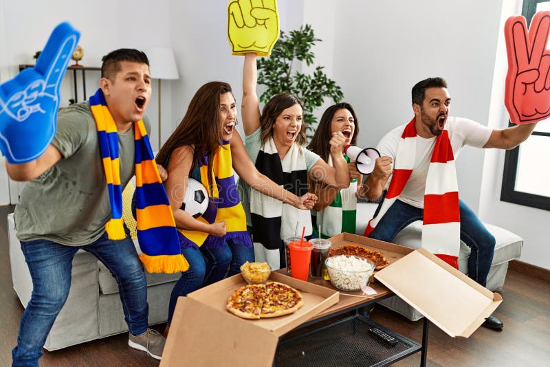 Group of Young Friends Watching and Supporting Soccer Match at Home ...
