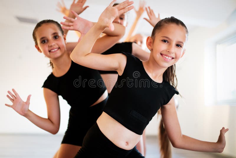 Group of Young Girls Practicing and Exercising Modern Ballet Dance ...