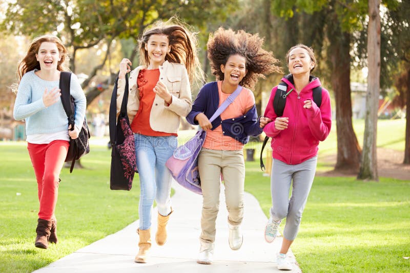 Group of Children Running Along Path Towards Camera in Park Stock Image ...