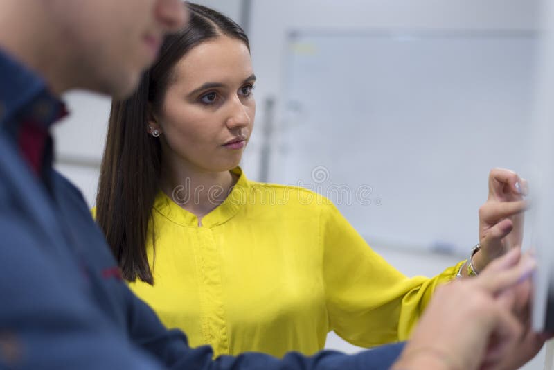 Group of Young Handsome Engineers Working on Electronics Components ...