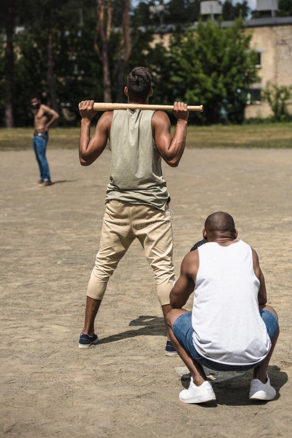 Young Handsome Men Playing Baseball on Court Stock Photo - Image of ...