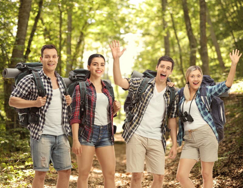 Group of Young Hikers with Backpacks in a Forest Stock Image - Image of ...